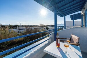 Quarto Quádruplo Superior | Vista para a praia ou o mar