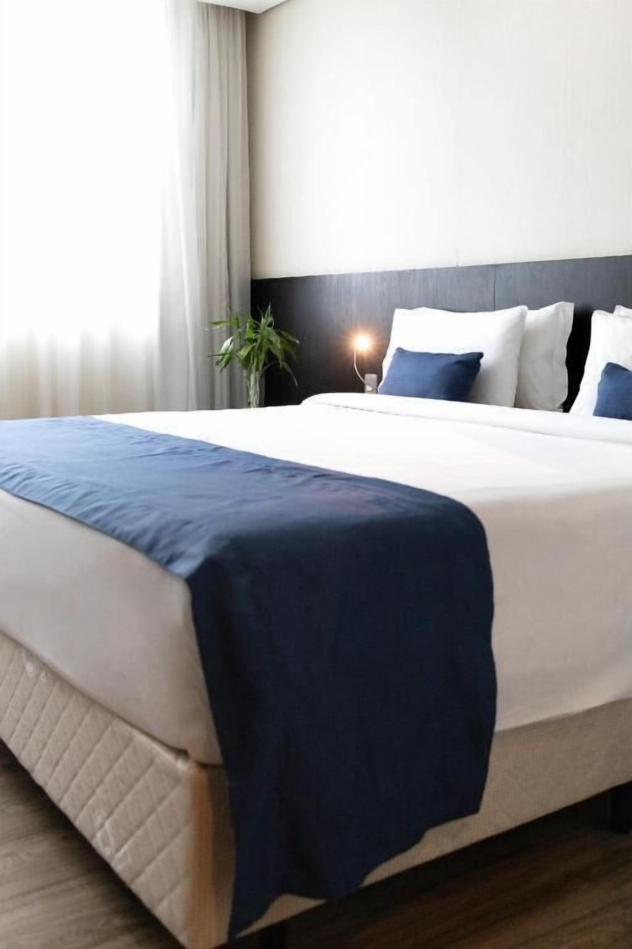 Quarto Duplo Premium | Roupa de alta qualidade, minibar, cofre no quarto, secretária 