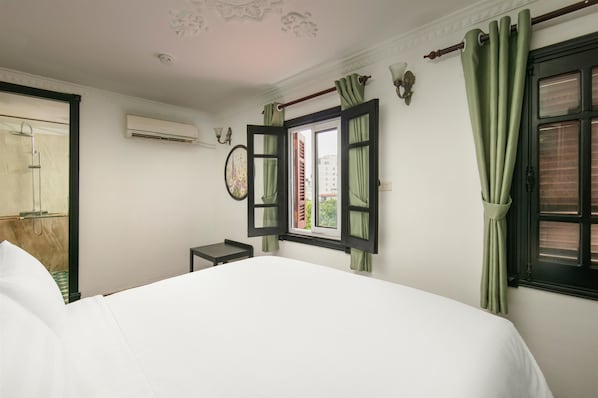 Quarto Deluxe, Vista para a cidade | Roupa de alta qualidade, camas de colchão viscoelástico, minibar
