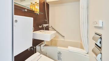 Uma combinação polibã/banheira, artigos de higiene pessoal grátis