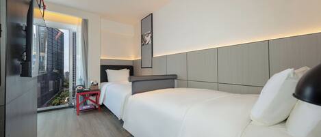 Quarto standard, 2 camas de solteiro | Edredons de pluma, cofres nos quartos, cortinas blackout