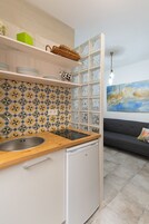 Apartamento, banheiro privativo (fully equipped kitchen) | Cozinha americana privada