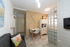 Apartamento, banheiro privativo (fully equipped kitchen) | Sala de estar