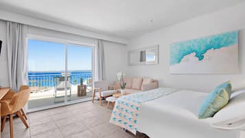Suíte júnior, terraço, vista para o mar | 1 quarto, cofres nos quartos, individualmente mobiliados, escrivaninha