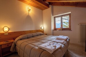 Apartamento Signature | Roupa de cama fornecida