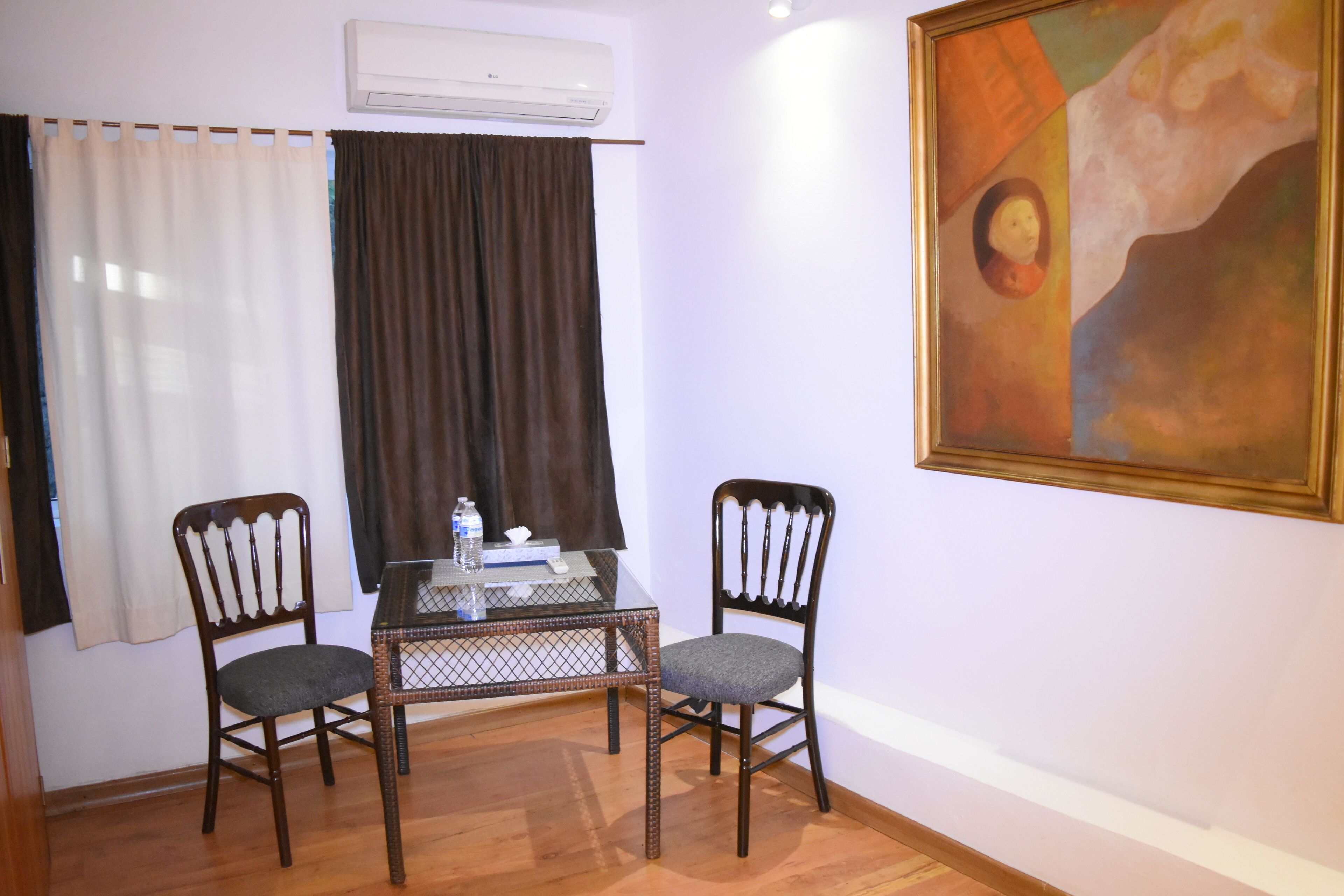 Quarto Deluxe, vista para o jardim (Tulipán) | Sala de estar