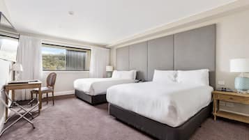 Quarto Twin Deluxe | 1 quarto, roupa de alta qualidade, camas de colchão pillowtop, minibar