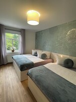 Apartamento (7) | Cofres nos quartos, Wi-Fi de cortesia, roupa de cama