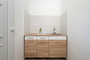 Quarto Standard, 2 camas individuais | Kitchenette privada | Minifrigorífico 