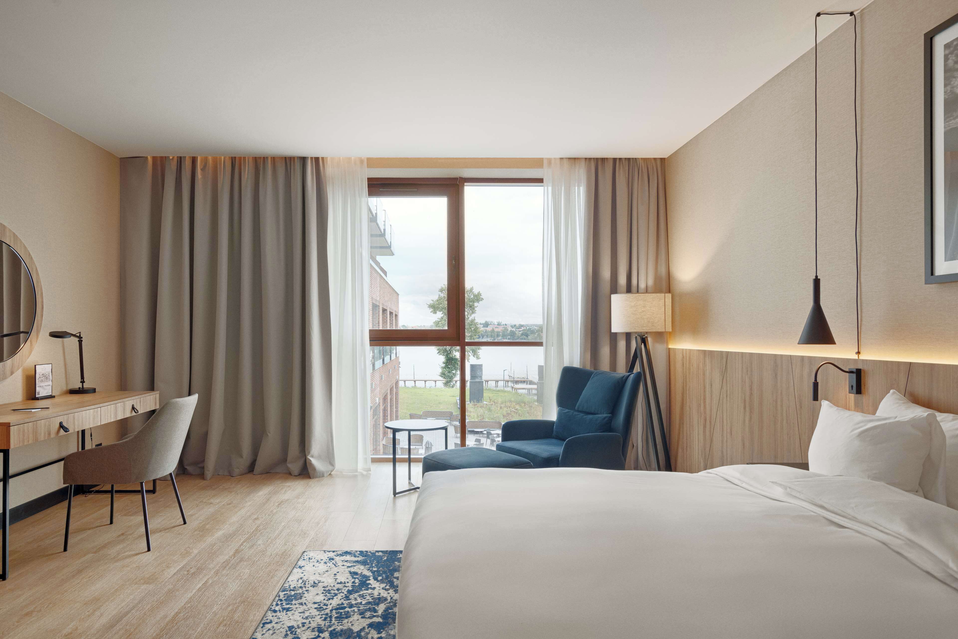 Quarto superior, sacada | Frigobar, cofres nos quartos, cortinas blackout