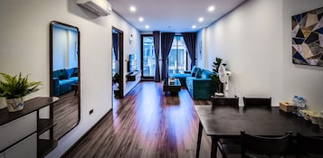 Suíte premium, 1 quarto | Área de estar