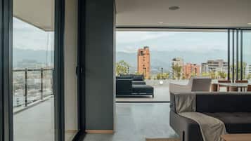 Apartamento, 1 quarto | Sala de estar | TV de ecrã plano