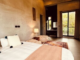 Quarto casal luxo | Área de estar