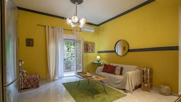 Apartamento família | Área de estar | Smart TV