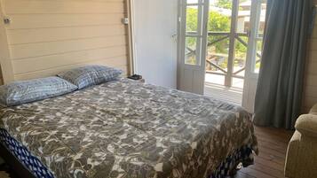 Casa premium, acesso à piscina, vista para a praia | 2 quartos, roupas de cama premium, individualmente decorados