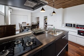 Vila | Cozinha privada | Geladeira, micro-ondas, cooktop, torradeira