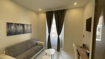 Suíte júnior | Edredons de pluma, cofres nos quartos, individualmente decorados