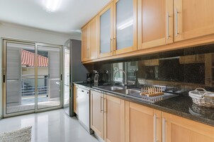 Apartamento urbano | Cozinha privada | Cadeirão de bebê