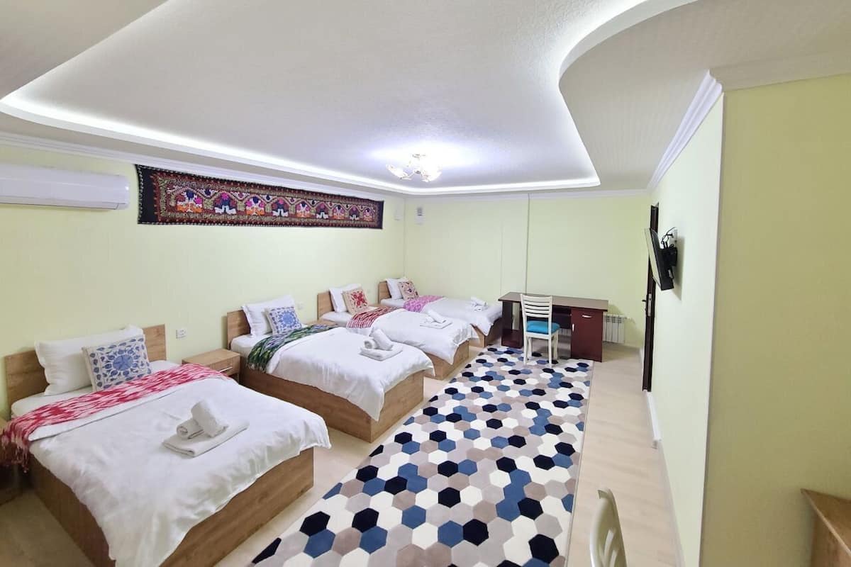 Quarto quádruplo standard | 1 quarto, camas Select Comfort, Wi-Fi de cortesia, roupa de cama