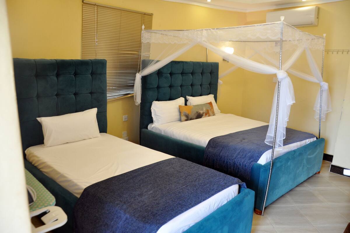 Quarto duplo superluxo | Ferros/tábuas de passar roupa, Wi-Fi de cortesia