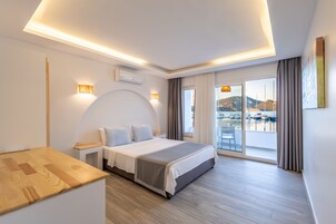 Quarto família | Frigobar, cofres nos quartos, quartos à prova de som, Wi-Fi de cortesia