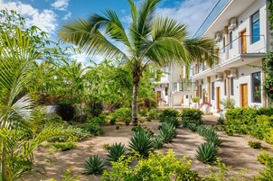 Quarto Triplo Deluxe | Terraço/pátio interior