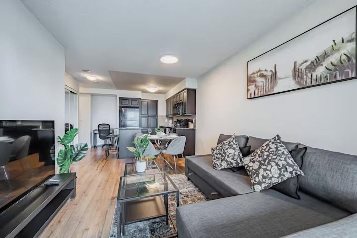 Apartamento Deluxe, 1 quarto, não fumadores | Sala de estar | Smart TV de 50 de polegadas com canais digitais, televisor, Netflix 