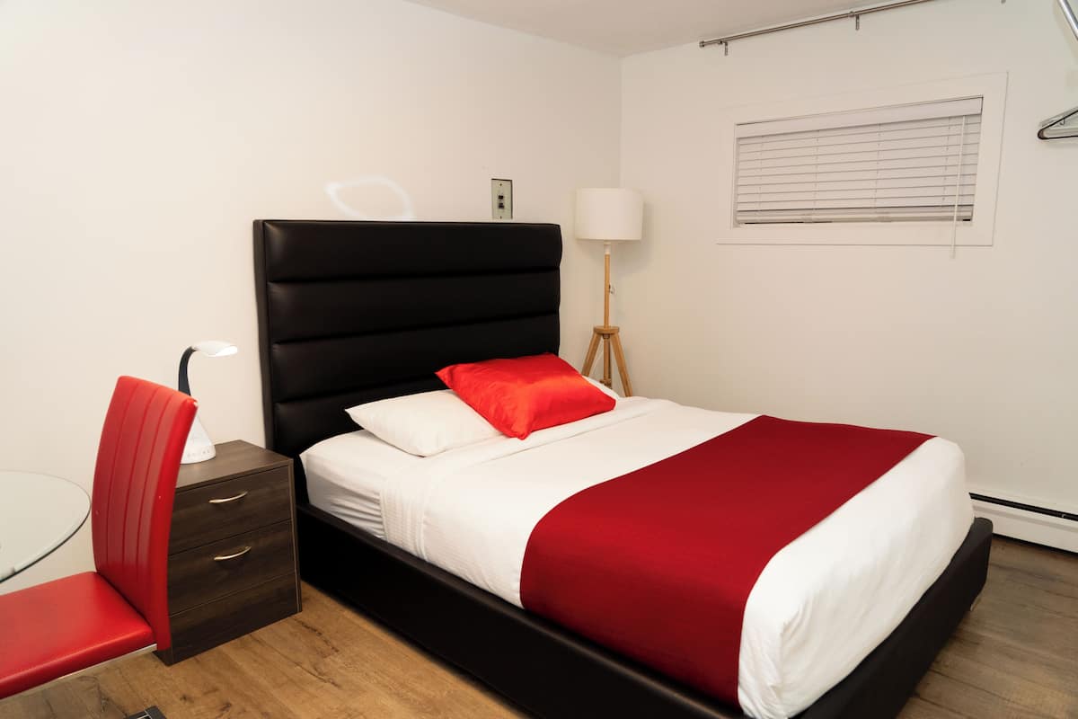 Quarto Premium | Com mobília individualizada, cortinas/cortinados opacos, Wi-fi grátis