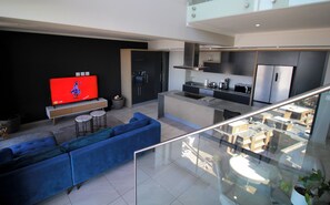 Penthouse de Luxo | Sala de estar | Smart TV de 65 polegadas com canais digitais, Netflix 