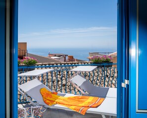 Quarto casal exclusivo, vista para o mar | Terraço/pátio