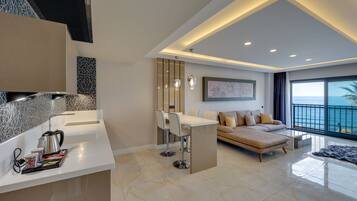 Suite Deluxe | 1 quarto, minibar, cofre no quarto, secretária