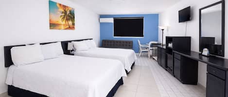 Suite-Estúdio Deluxe, 2 camas queen-size | Edredões de penas, ferro/tábua de engomar, roupa de cama fornecida