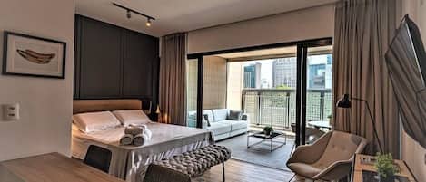 Estúdio standard | Área de estar | TV de tela plana