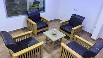 Quarto executivo | Área de estar