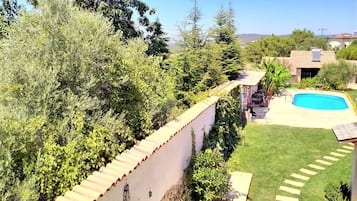 Quarto Duplo Deluxe, varanda, vista para o jardim | Vista para o jardim