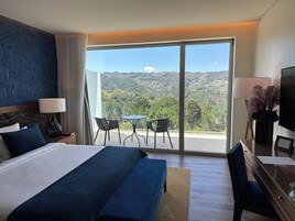 Quarto casal conforto | Frigobar, individualmente decorados, individualmente mobiliados