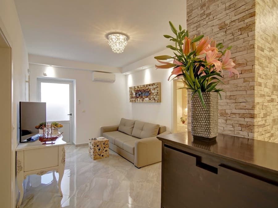 Apartamento (Deluxe Two Bedroom Apartment with Swi) | Sala de estar | TV