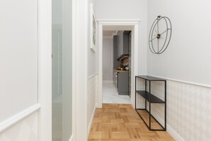 Apartamento, 2 quartos, cozinha | Casa de banho | Um polibã, toalhas fornecidas 