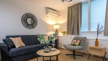 Apartamento de Luxo | Sala de estar | Televisor