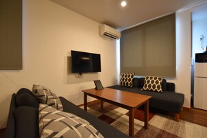 Quarto duplo superior | Ferros/tábuas de passar roupa, Wi-Fi de cortesia