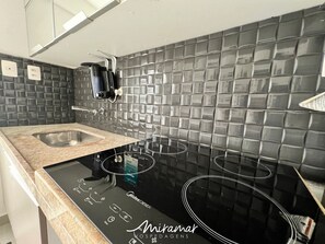 Apartamento | Cozinha privada | Frigobar, liquidificador