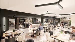 Um restaurante moderno com área de bar, mesas para hóspedes e um espaço para exibição de vinhos.