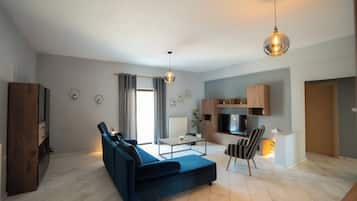 Condo família | Área de estar | Smart TV 50 polegadas com canais a cabo, Netflix, serviços de streaming