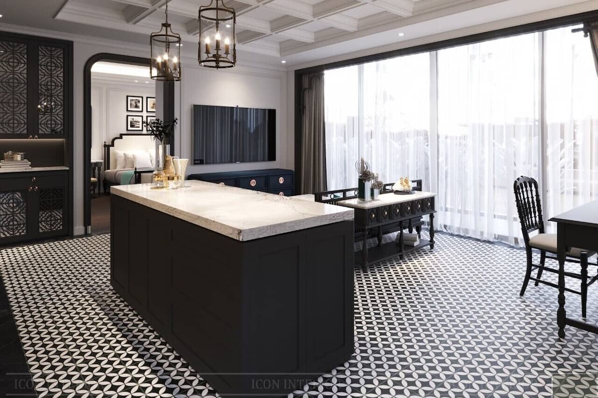 Uma cozinha moderna com ilha central, iluminação pendente e área de refeições com mesa e cadeiras.