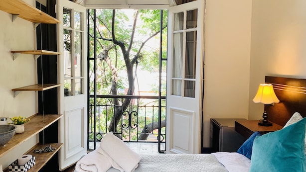 Quarto panorâmico | 1 quarto, frigobar, Wi-Fi de cortesia, roupa de cama