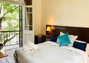 Quarto Panorâmico | 1 quarto, minibar, Wi-fi grátis, roupa de cama fornecida