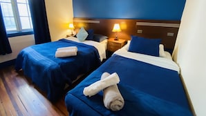 Quarto família | 1 quarto, frigobar, Wi-Fi de cortesia, roupa de cama