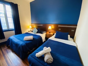 Quarto família | 1 quarto, frigobar, Wi-Fi de cortesia, roupa de cama