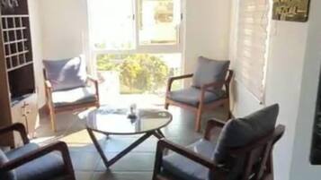 Apartamento, 1 quarto, fumadores, varanda | Sala