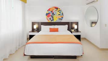 Quarto standard, 1 cama King | Cofres nos quartos, cortinas blackout, ferros/tábuas de passar roupa